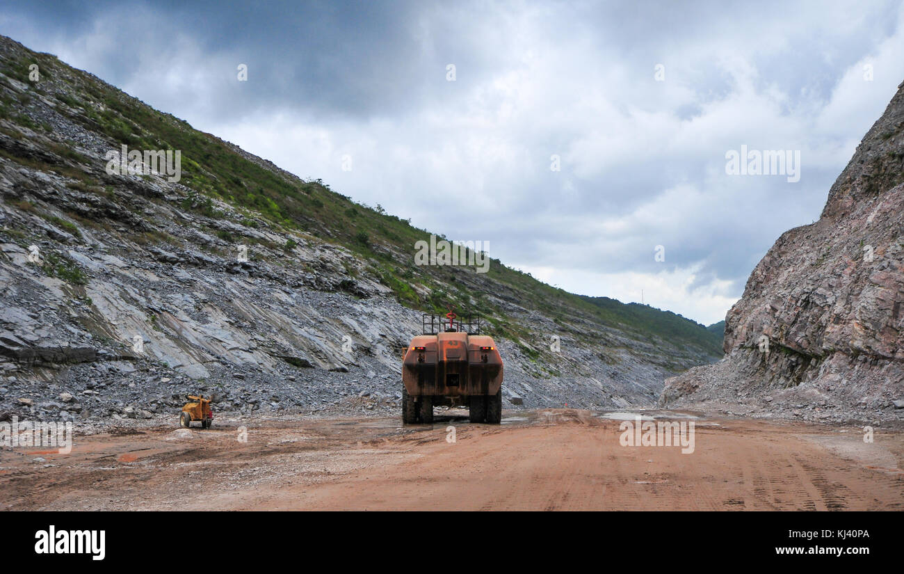 Open Pit Gold Mine, Africa with a water truck in the pit Stock Photo ...