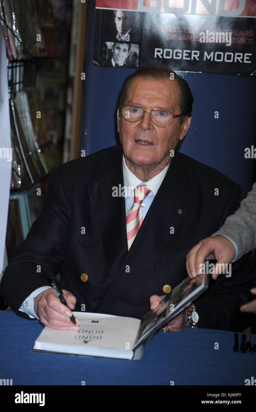 NEW YORK, NY - NOVEMBER 09: Sir Roger Moore meets fans and signs copies ...