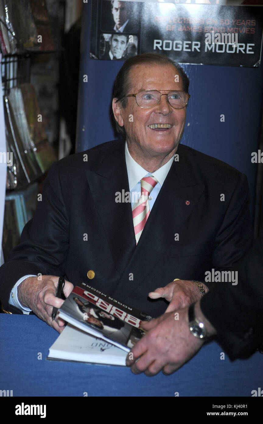 NEW YORK, NY - NOVEMBER 09: Sir Roger Moore meets fans and signs copies ...