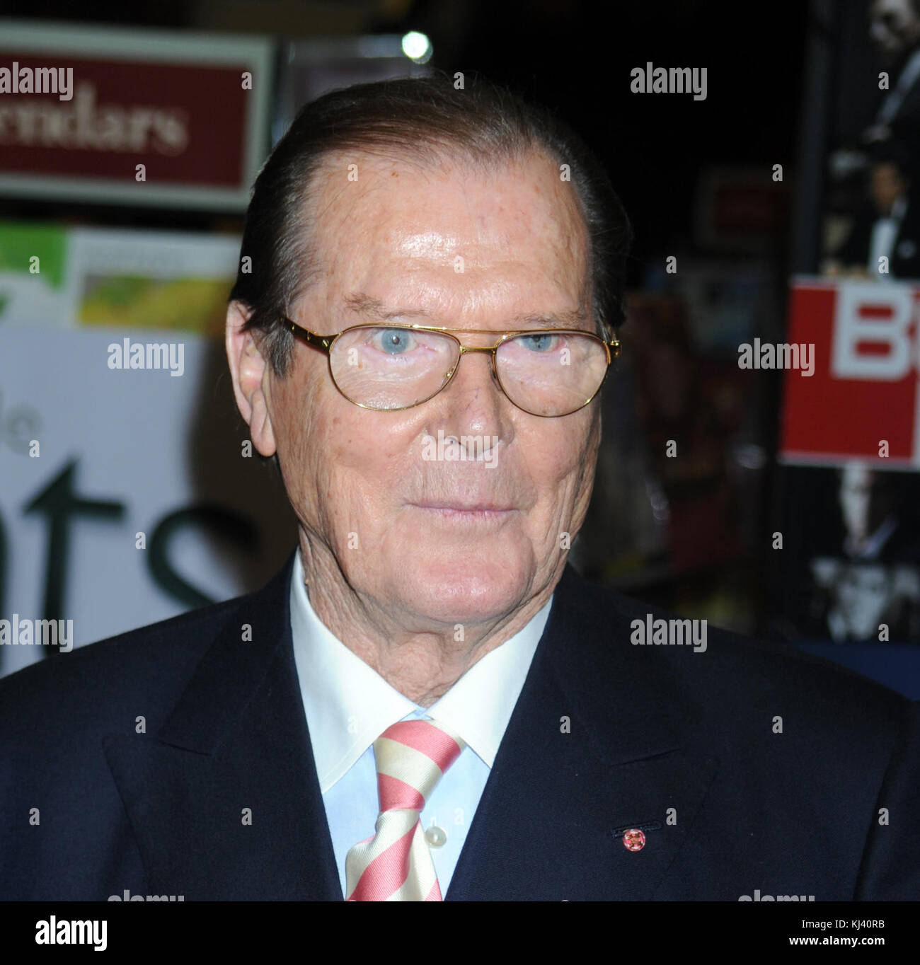 NEW YORK, NY - NOVEMBER 09: Sir Roger Moore meets fans and signs copies ...
