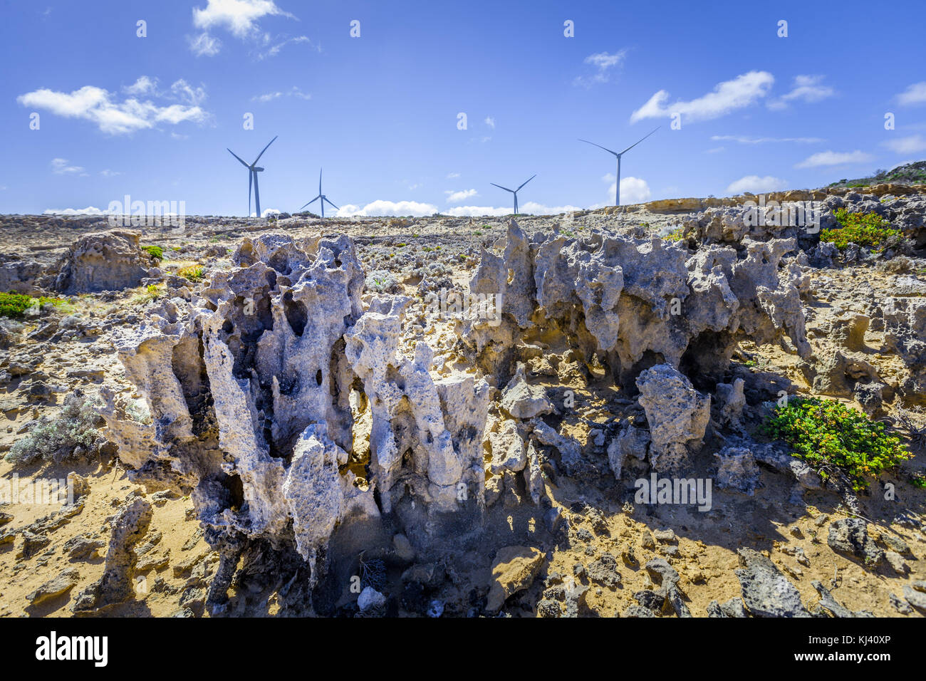 Weathered rock formations and wind turbines - renewable energy and ...