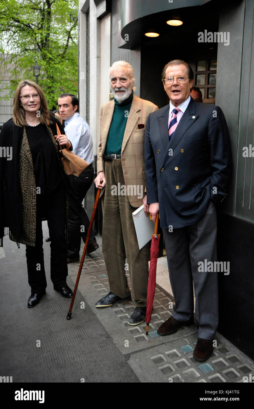 LONDON, ENGLAND - APRIL 26: Sir Christopher Lee, Sir Rodger Moore ...
