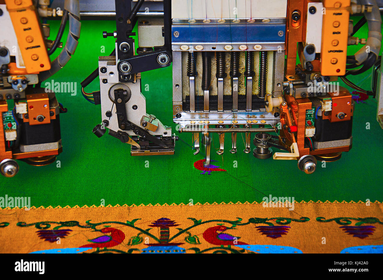 Close-up of automatic saree weaving machine needles, weaving ...