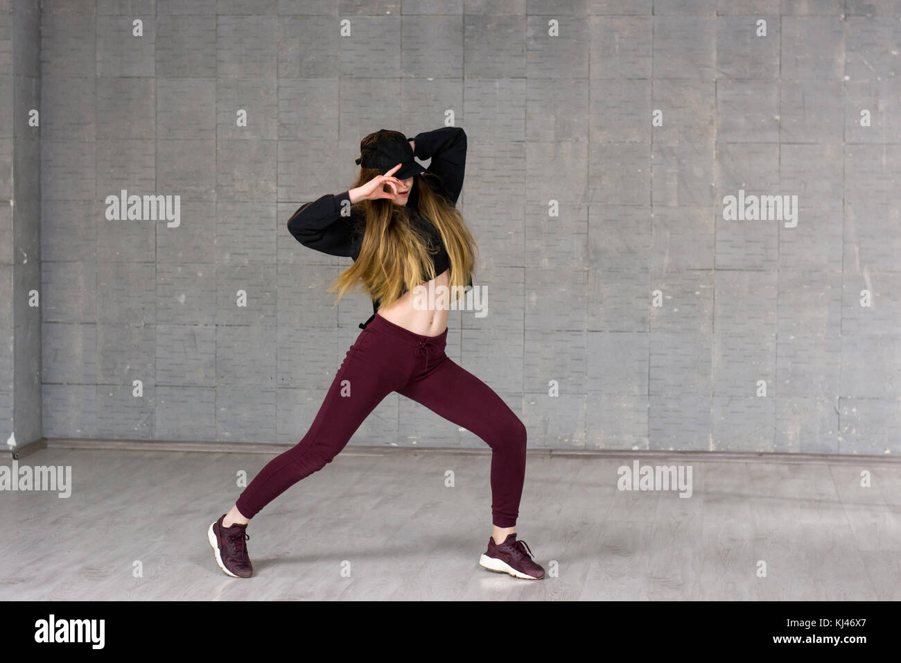 Young urban woman dancing Stock Photo - Alamy