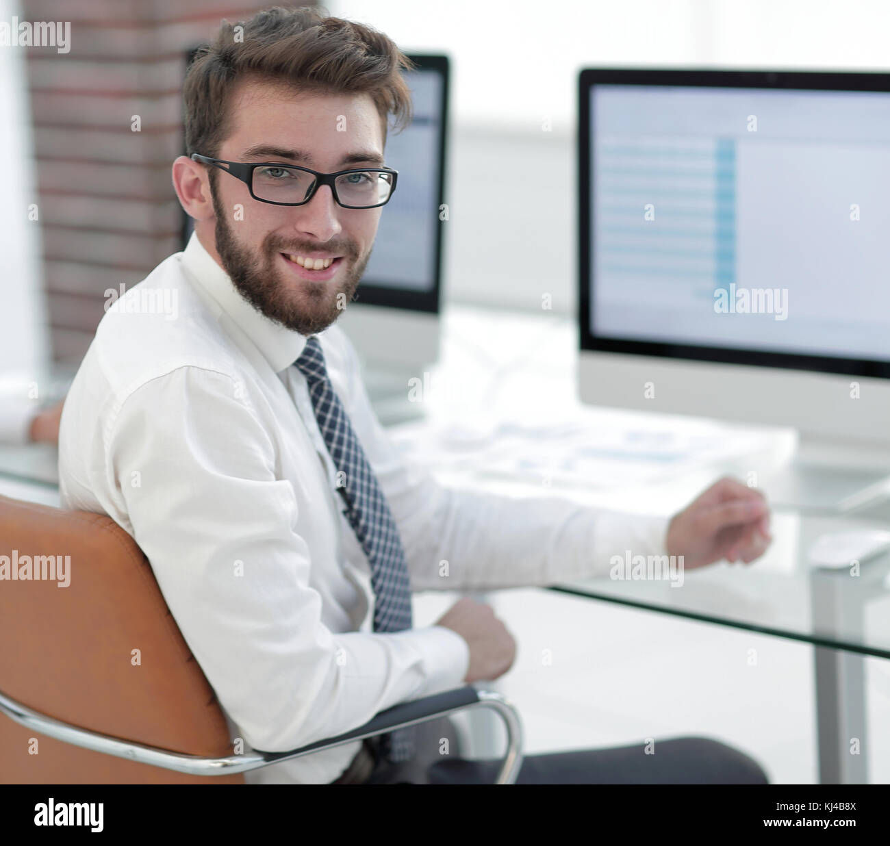 experienced programmer sitting in front of the monitor Stock Photo - Alamy