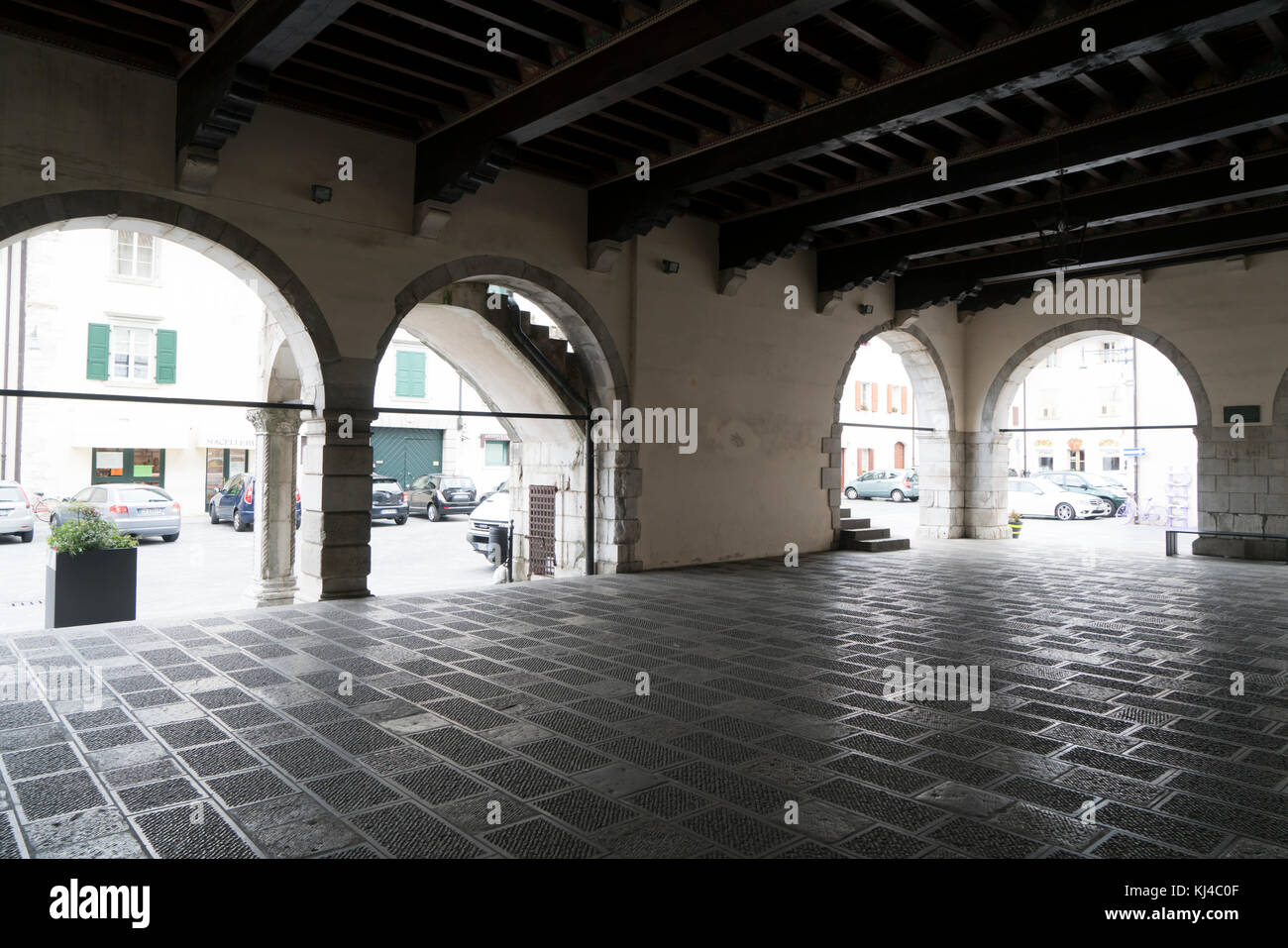 the portico of the medieval palace of the town hall in Venzone, Friuli ...