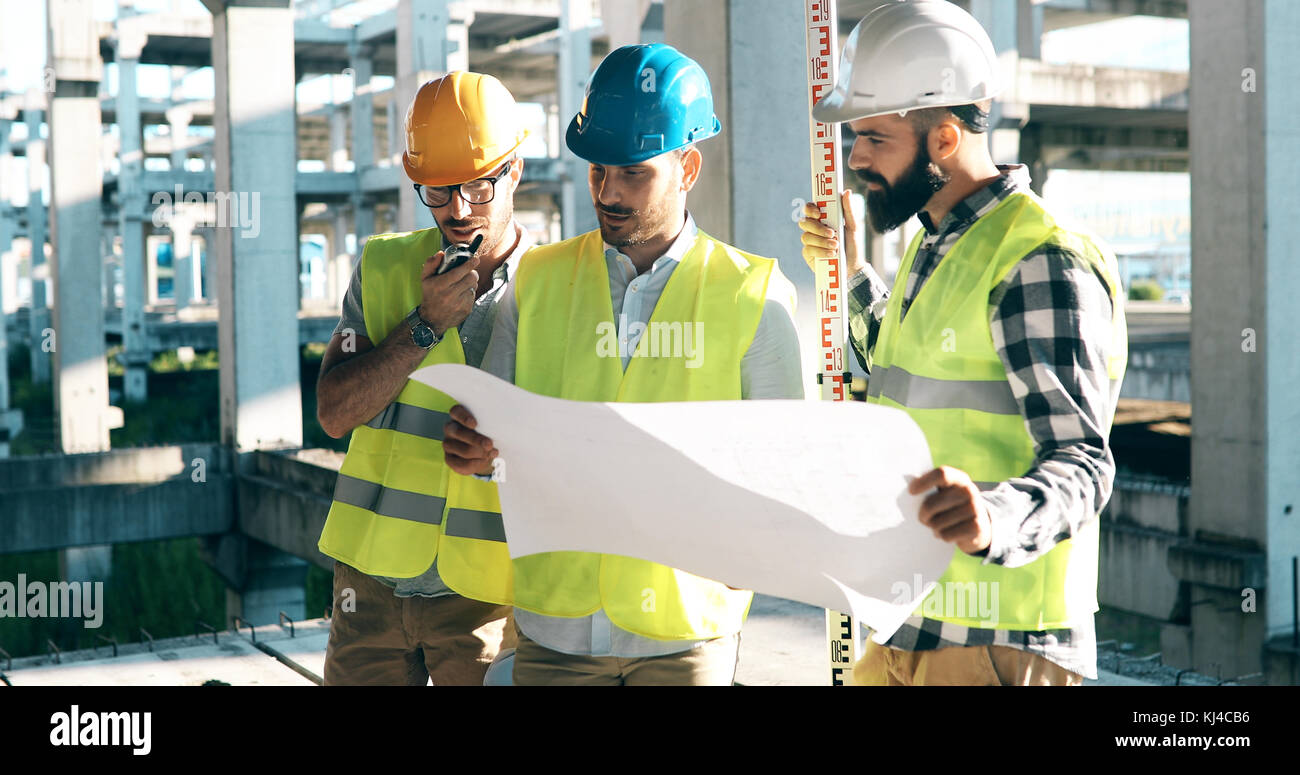 Group engineers architects foreman construction hi-res stock ...