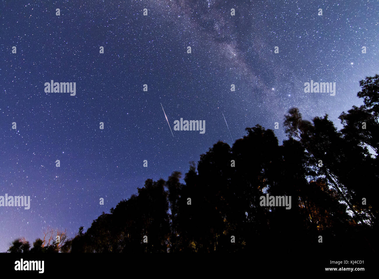 Double Iridium Flare Satellites catching a Sunbeam Stock Photo - Alamy