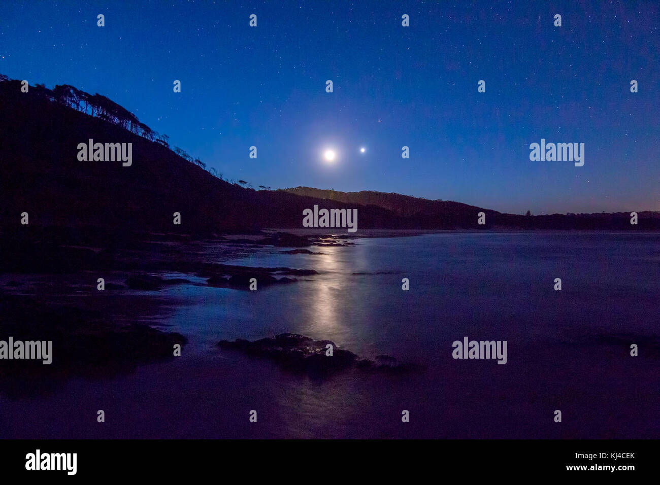 Moon Venus Mars Conjunction seen from Broken Head Stock Photo - Alamy