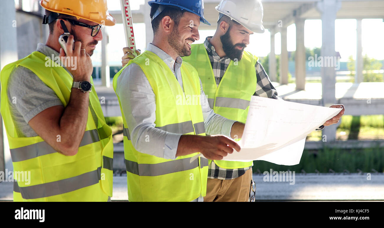 Group of engineering team had meeting at working site Stock Photo - Alamy
