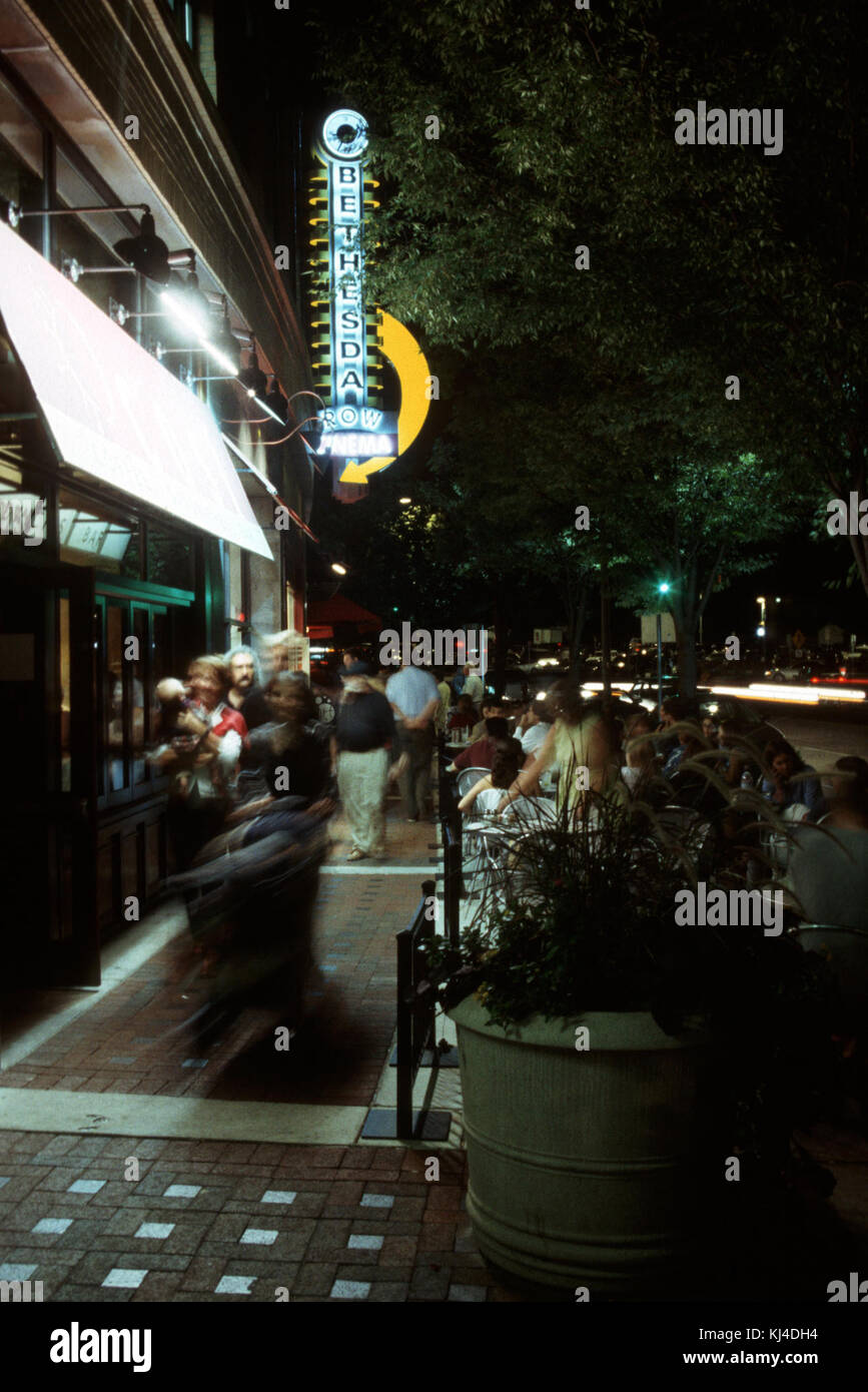 A city street illuminated at night, showcasing lights, shadows, and ...