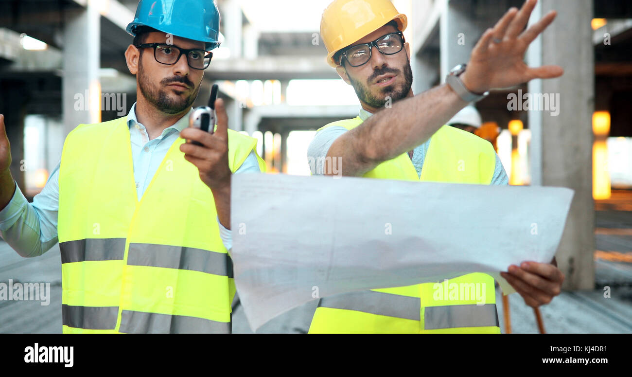 Group of engineering team had meeting at working site Stock Photo - Alamy