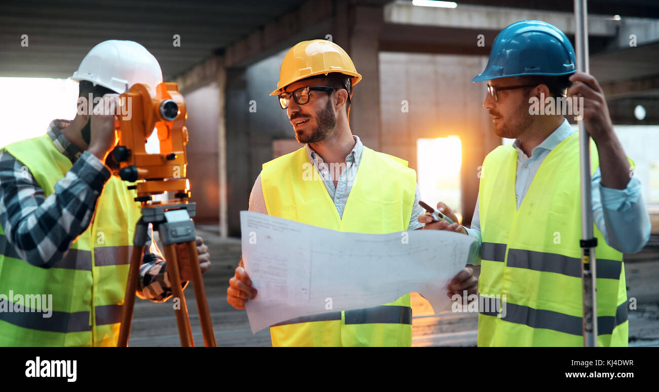 Group of engineering team had meeting at working site Stock Photo - Alamy