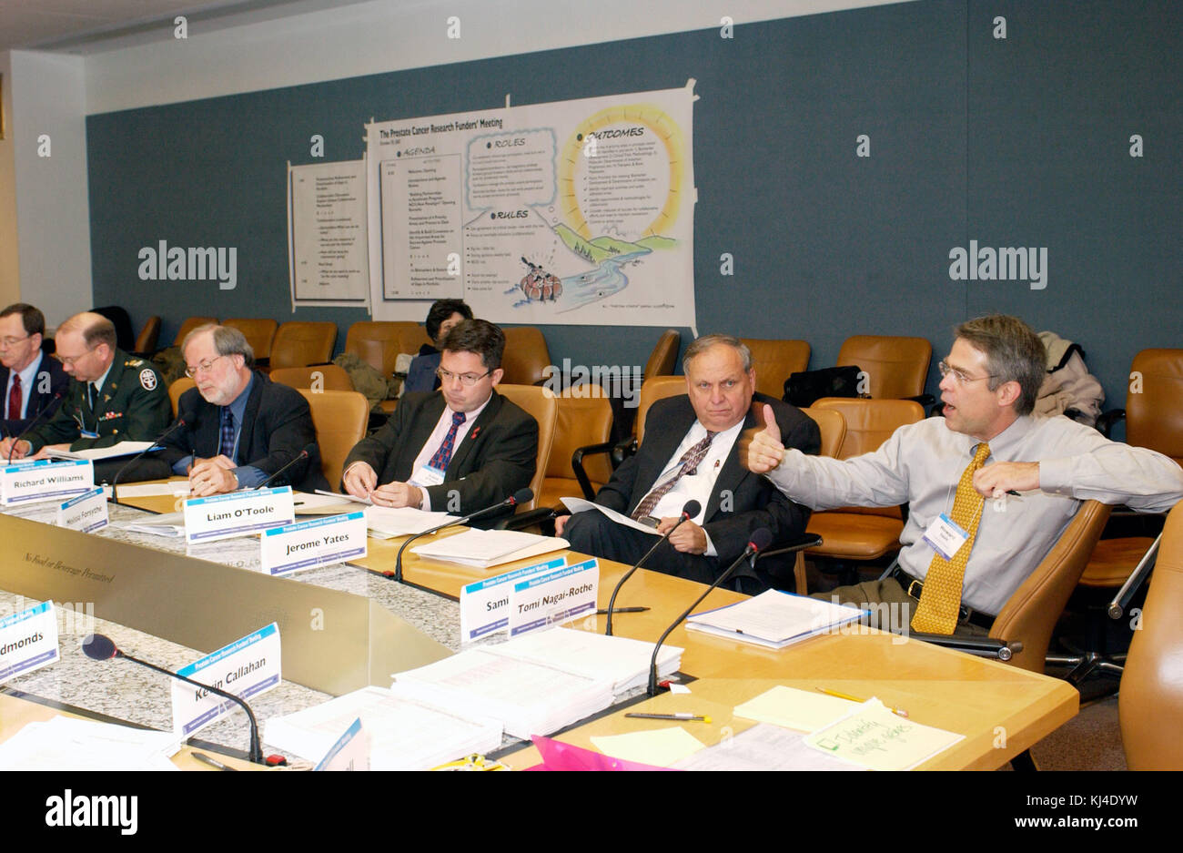 Discussions at funding meeting Stock Photo - Alamy