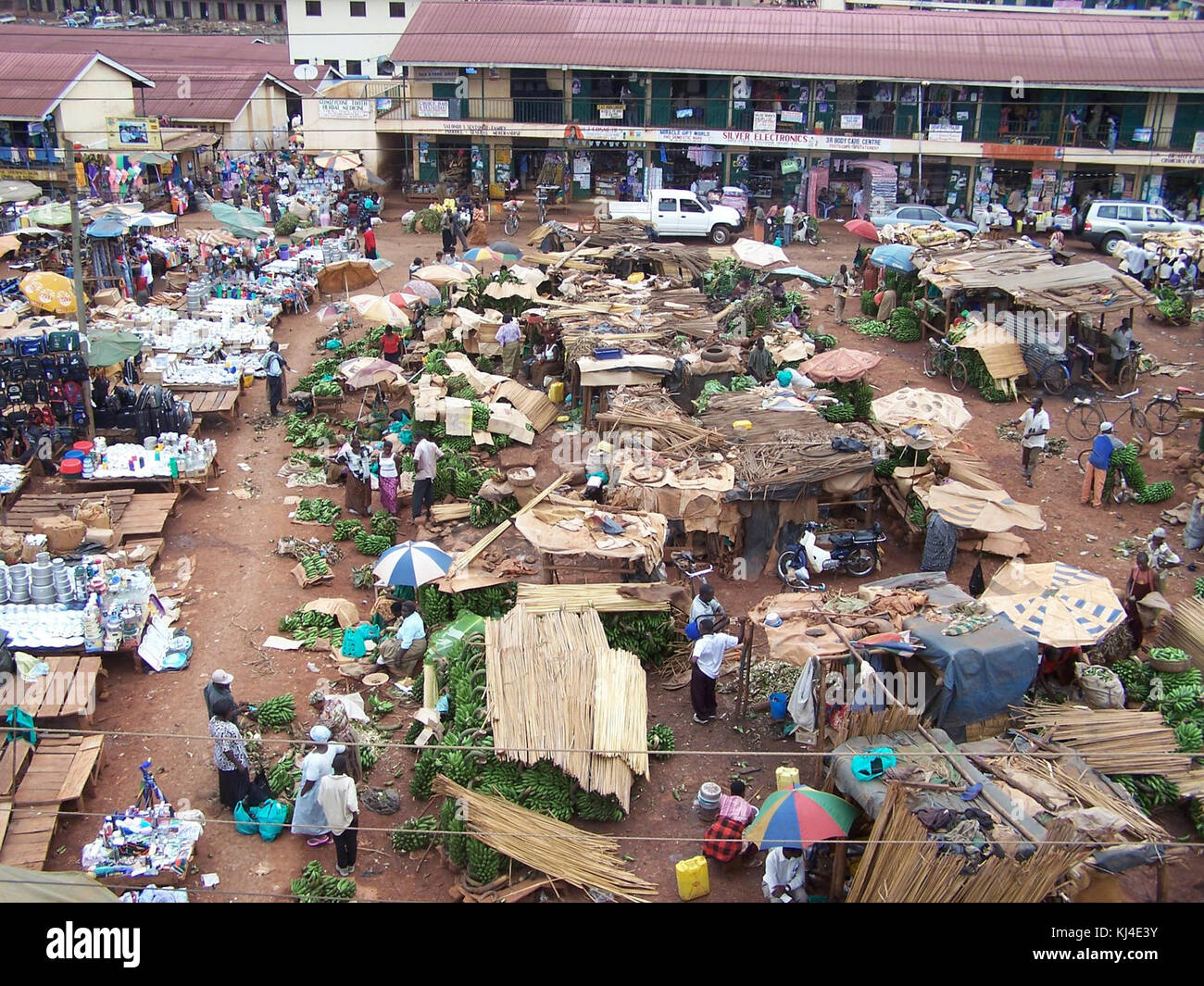 A photograph of a market in Kampala, Uganda, showing the vibrant ...