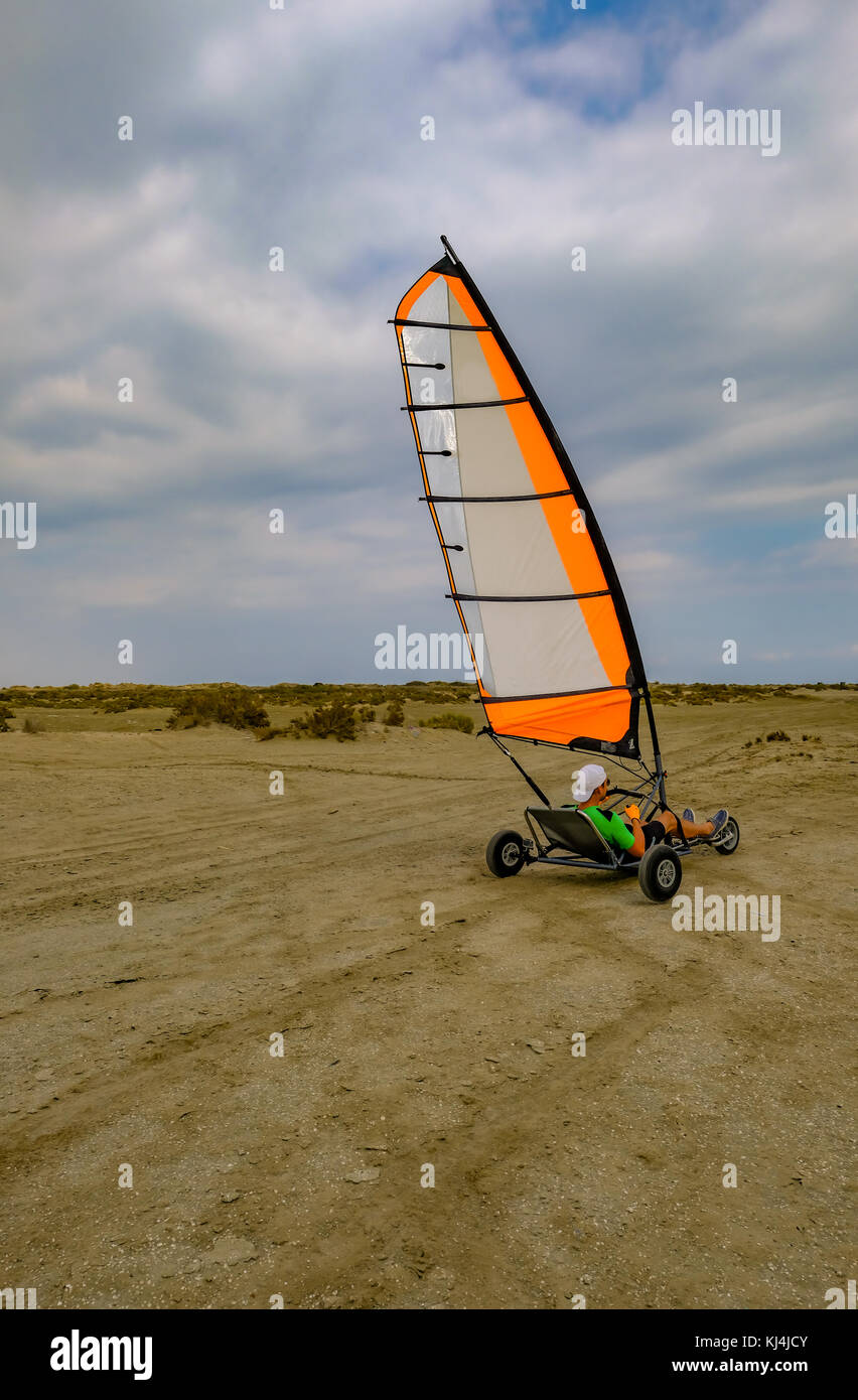 Back view of sail cart on the sand in Cyprus. Shot on a windy day at ...