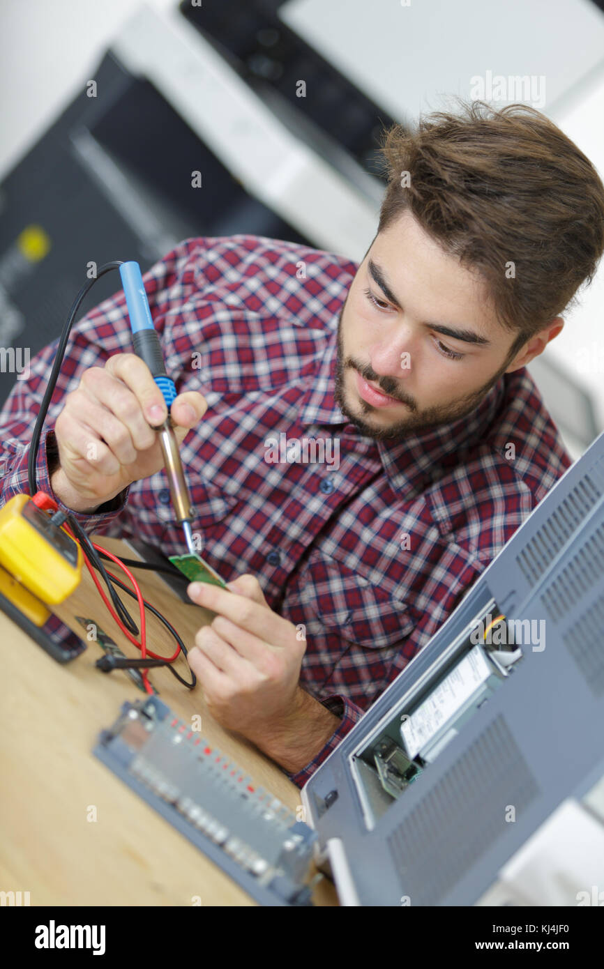 electronics student soldering device Stock Photo - Alamy