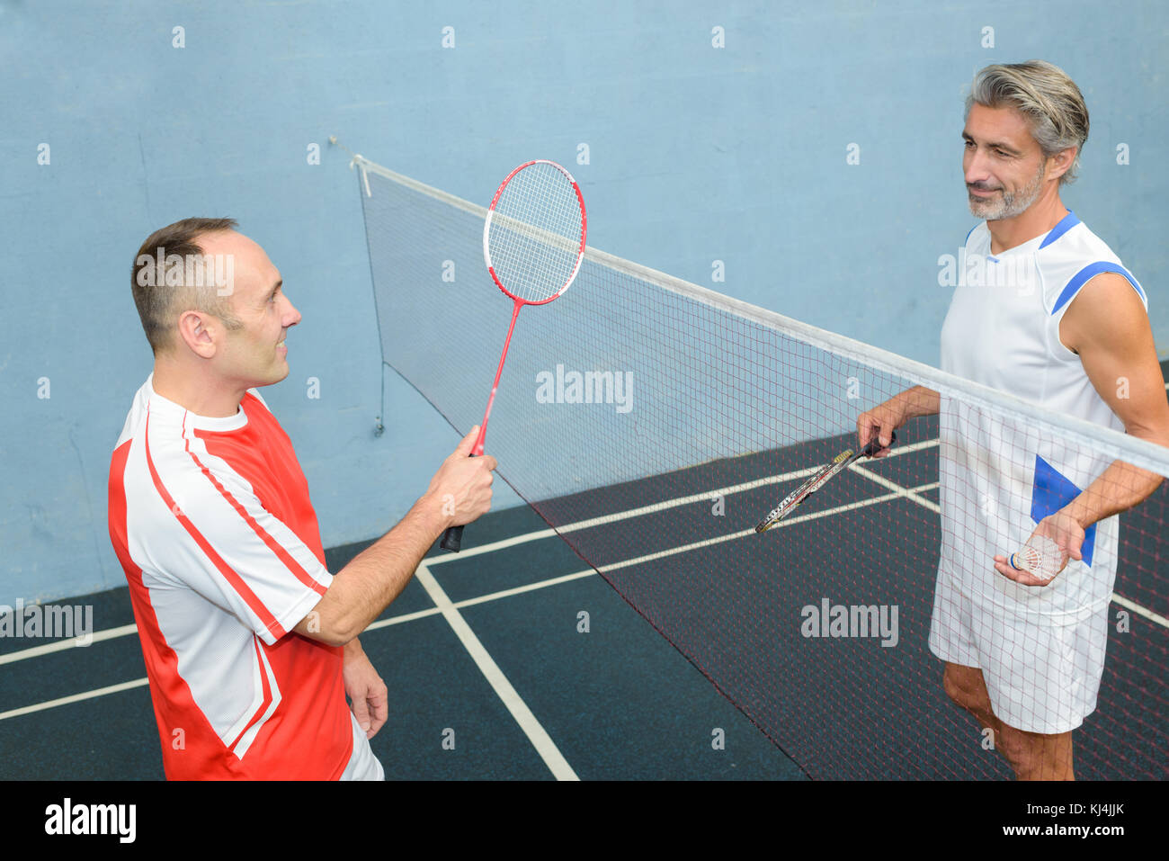 men playing badminton Stock Photo - Alamy