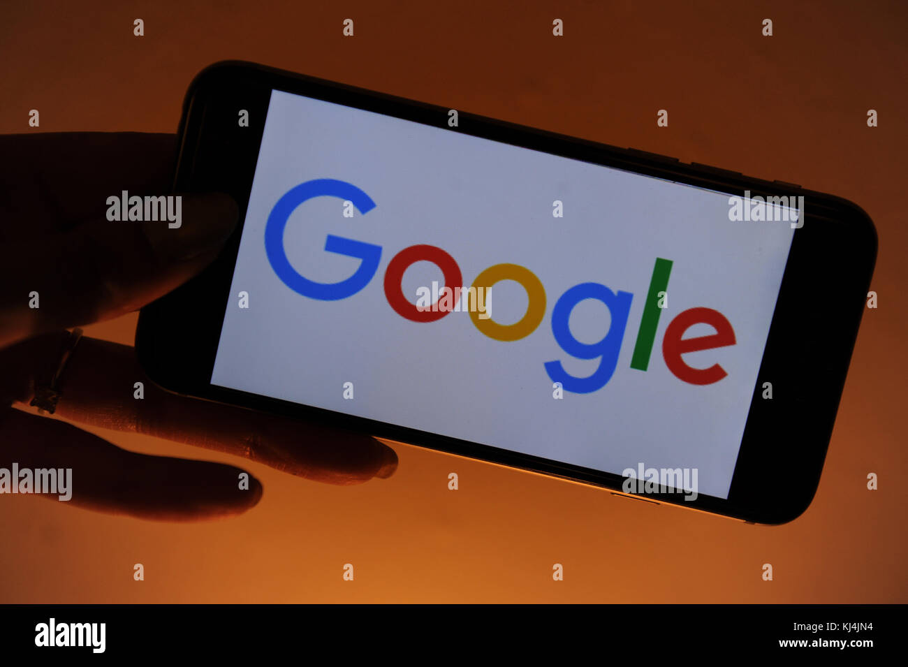 Google logo hand hi-res stock photography and images - Alamy