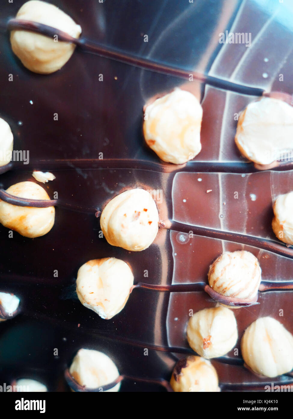 Hazel nuts in chocolate Stock Photo - Alamy