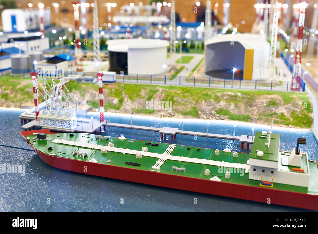 Miniature model of a tanker and layout of an oil base Stock Photo - Alamy