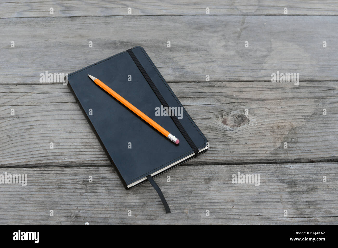 black journal on the table Stock Photo - Alamy