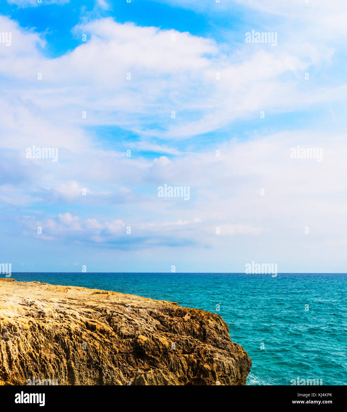 high cliff above the sea, summer sea background, many splashing waves ...