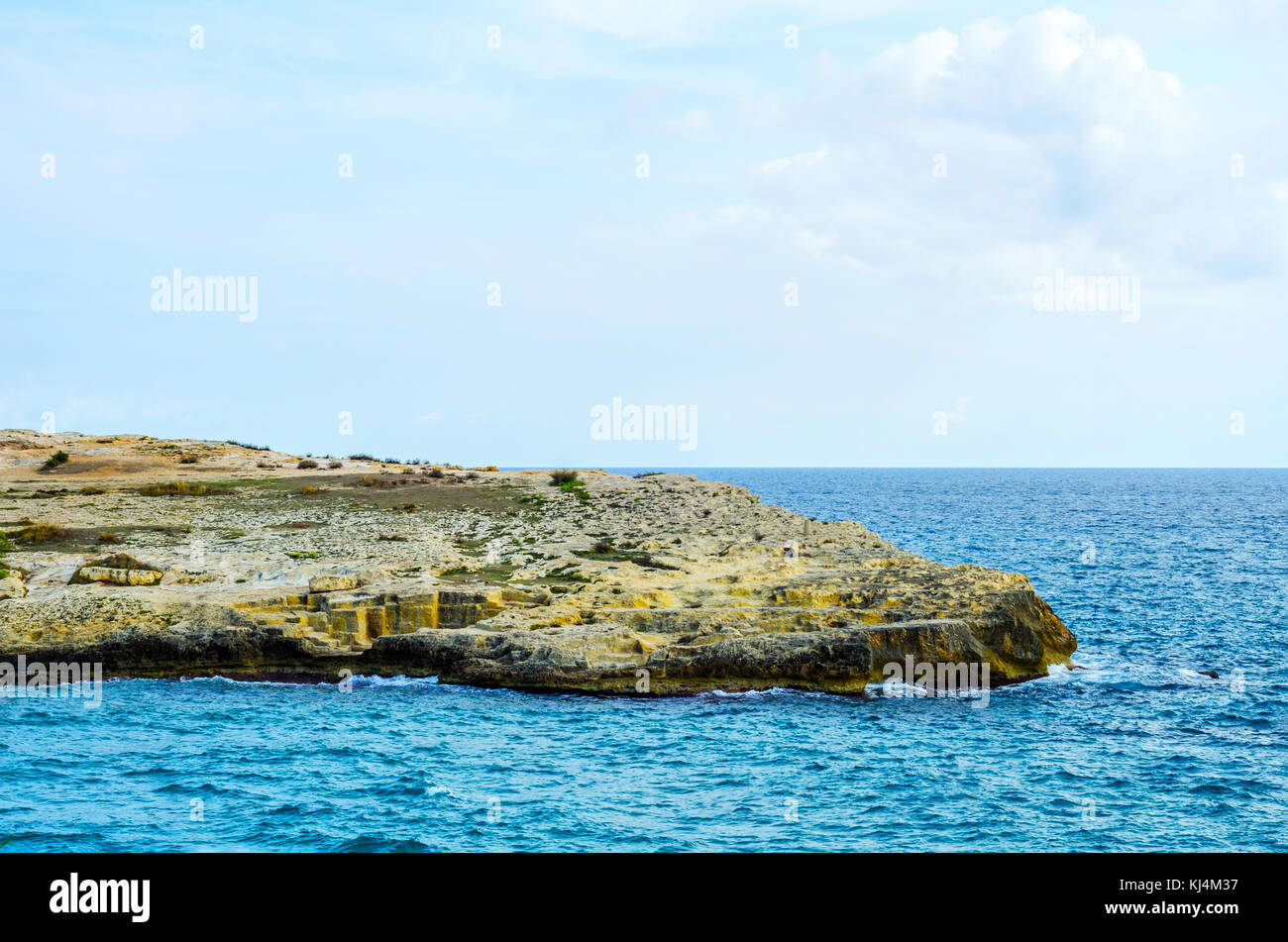 high cliff above the sea, summer sea background, many splashing waves ...