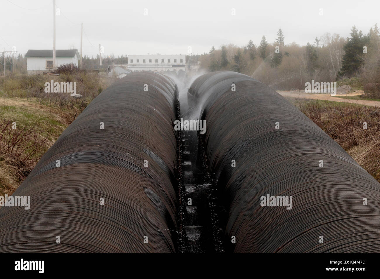 Long distance water pipes leaking Stock Photo - Alamy