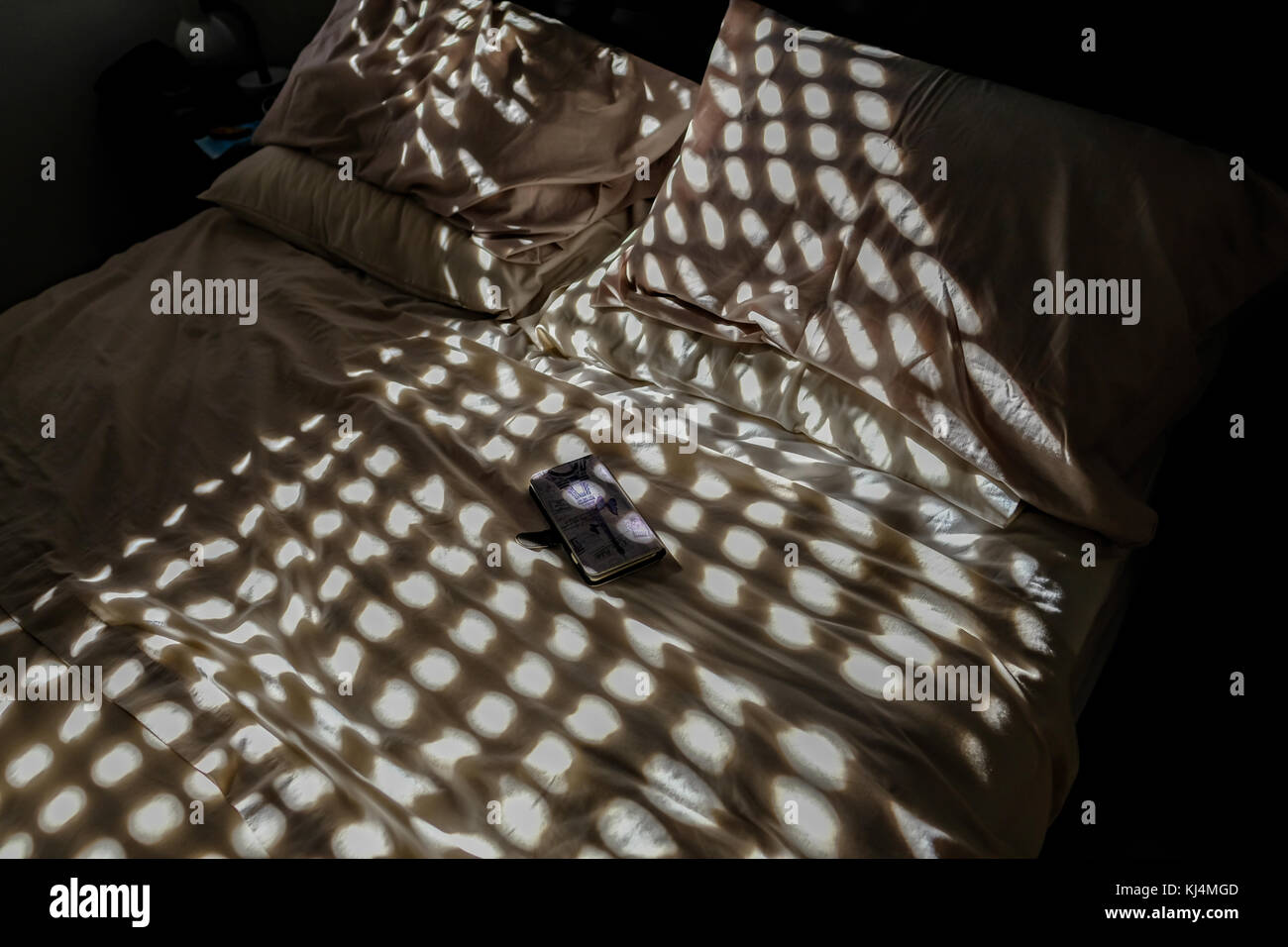 Dark room with unmade bed hi-res stock photography and images - Alamy