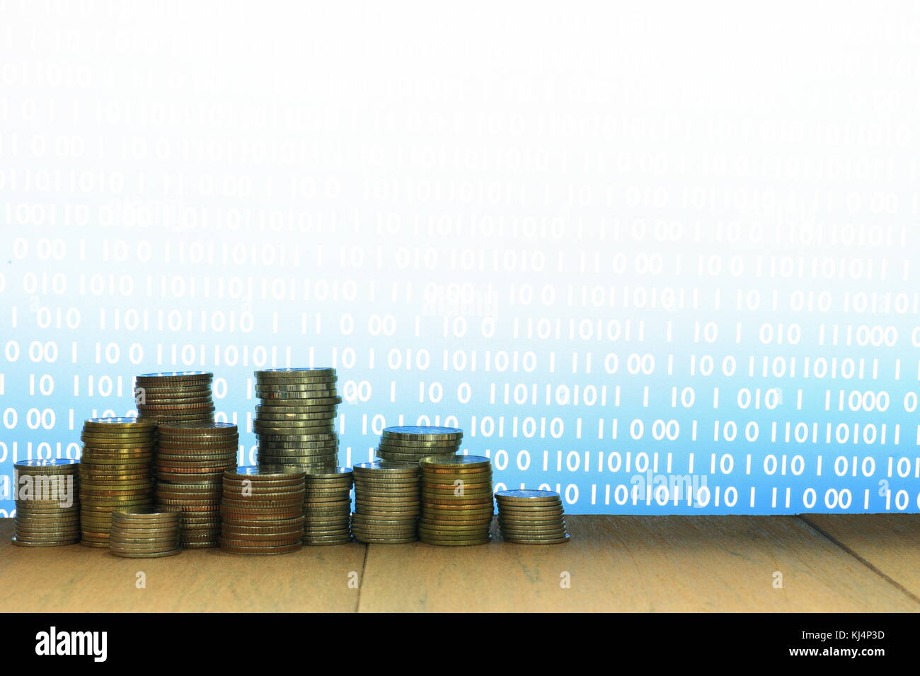 Digital economy. Coin stack with blue binary digital numbers background ...