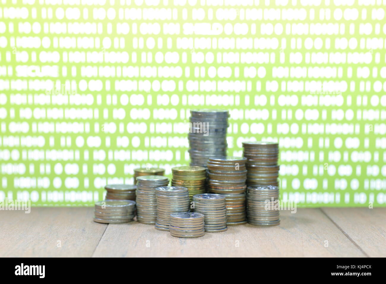 Digital economy. Coin stack increasing chart shape with green light and ...