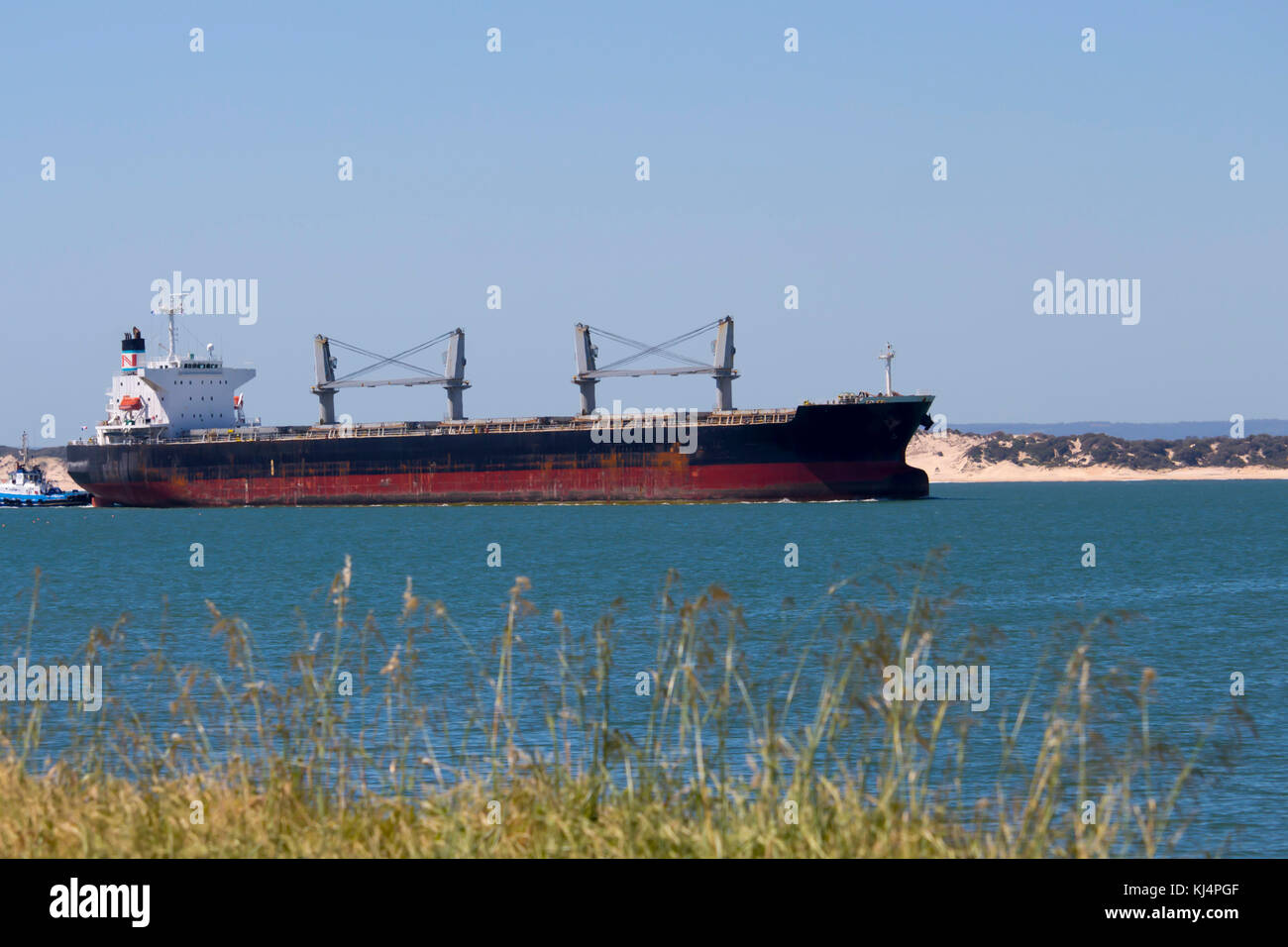 Large container ship entering channel to Bunbury Inner Harbour Western ...