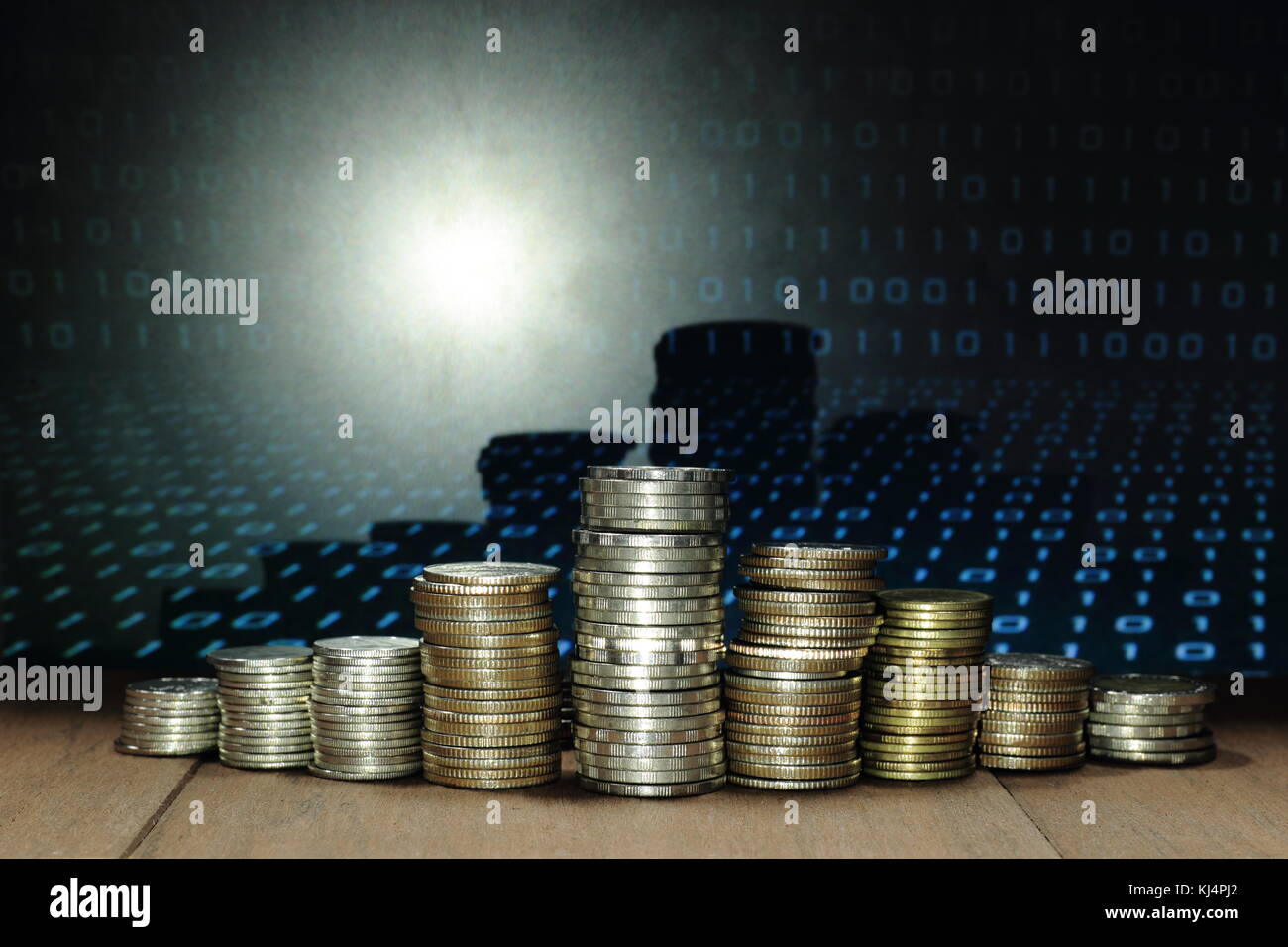 Digital economy. Coin stack pyramid shape with digital binary code in ...