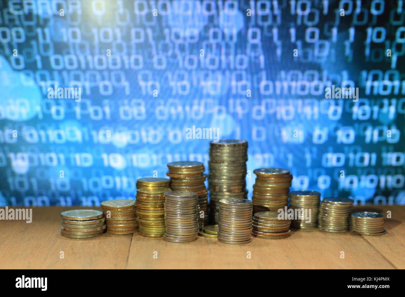 Digital economy. Coin stack pyramid shape with digital binary code in ...