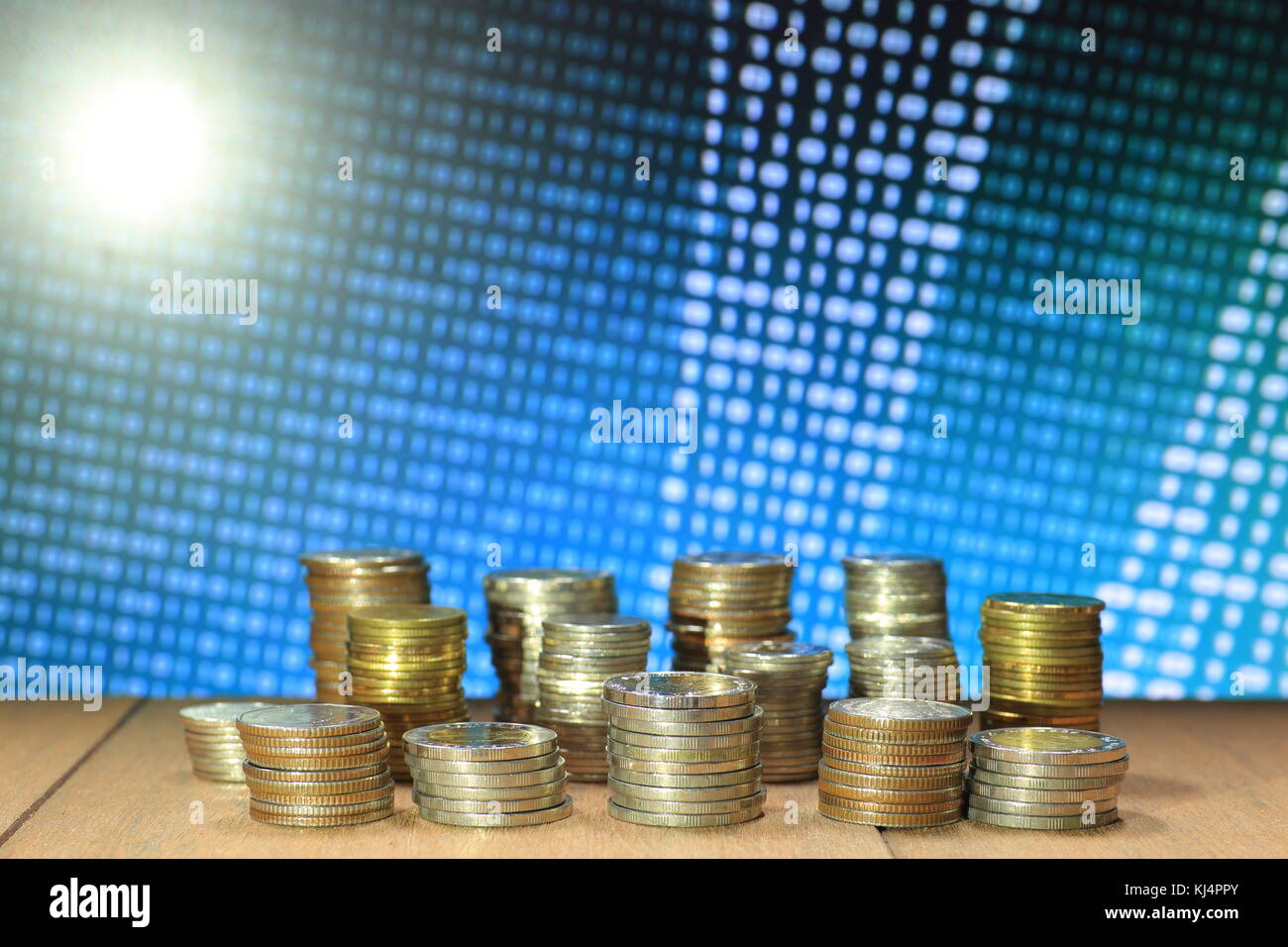 Digital economy. Coin stack pyramid shape with digital binary code in ...