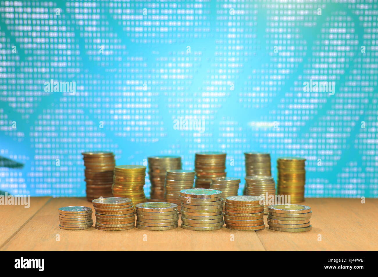 Digital economy. Coin stack with blue binary digital numbers background ...