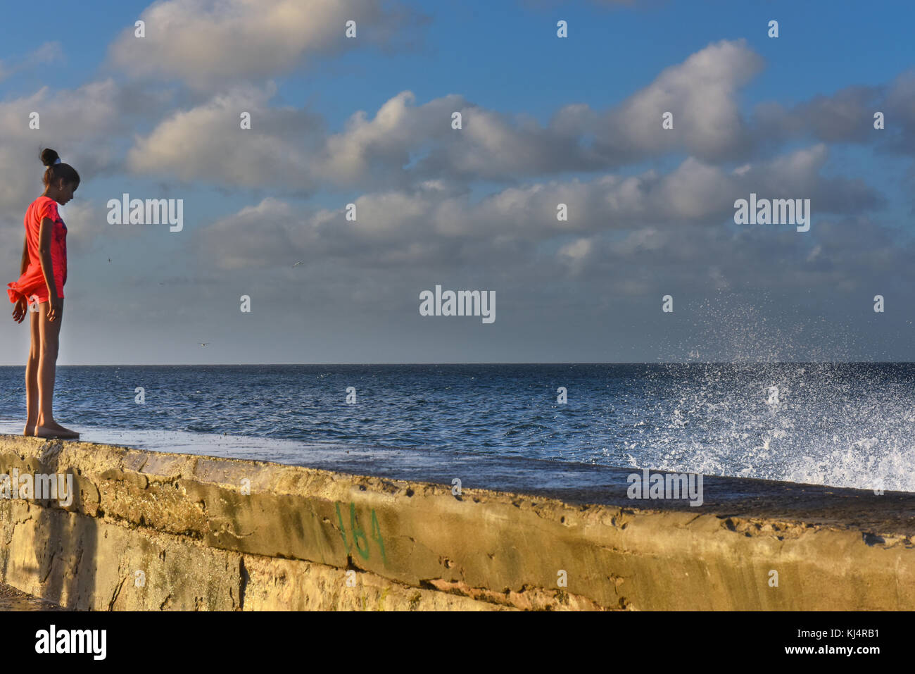 Young girl, Malecon, Havana Stock Photo - Alamy