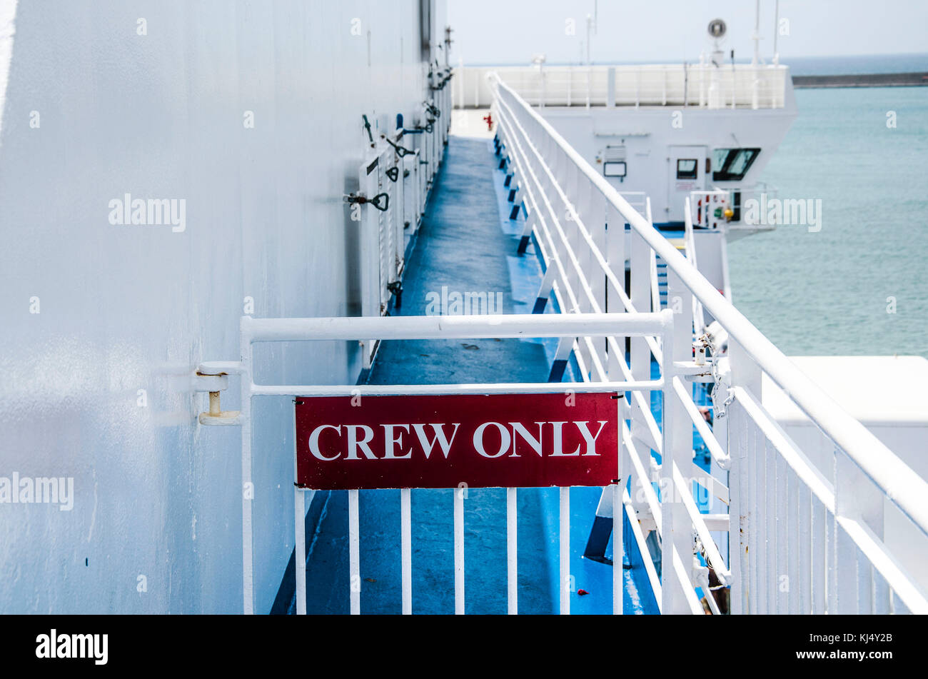 Sign "Crew only" on a ferry Stock Photo - Alamy