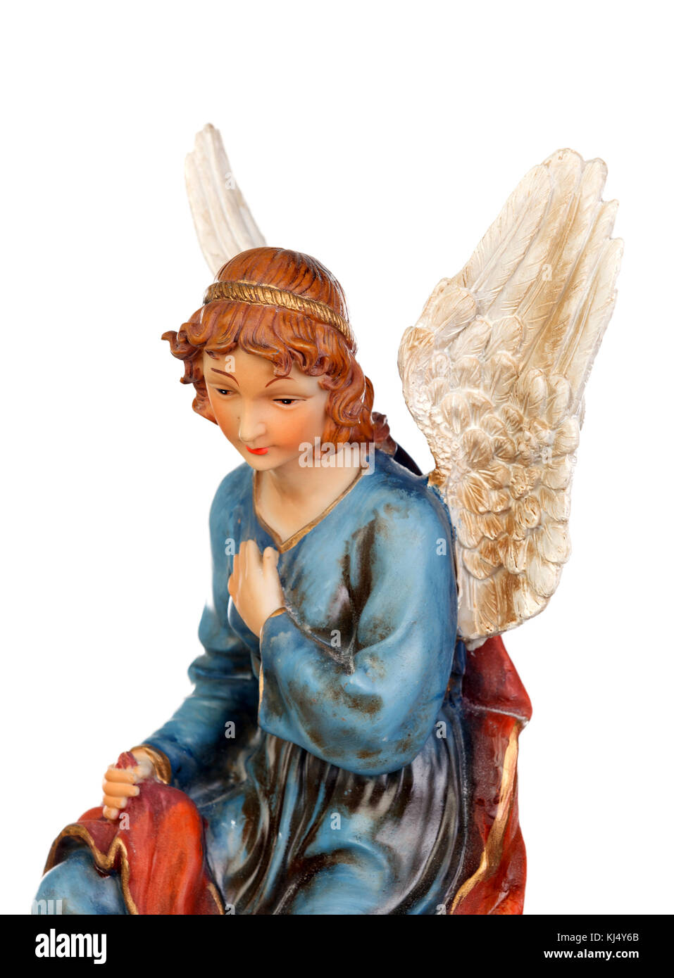 Ceramic figure of the angel of the nativity scene isolated on a white ...