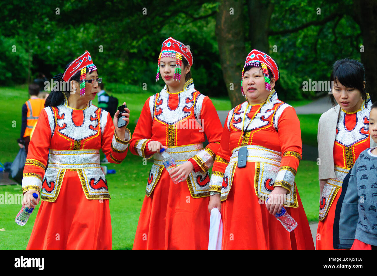 Female Chinese performers wearing costumes in the Carnival of The ...
