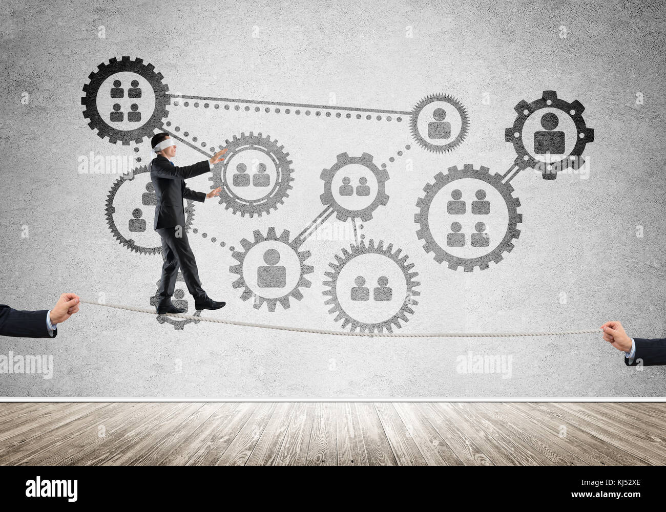 Business concept of risk support and assistance with man balancing on ...