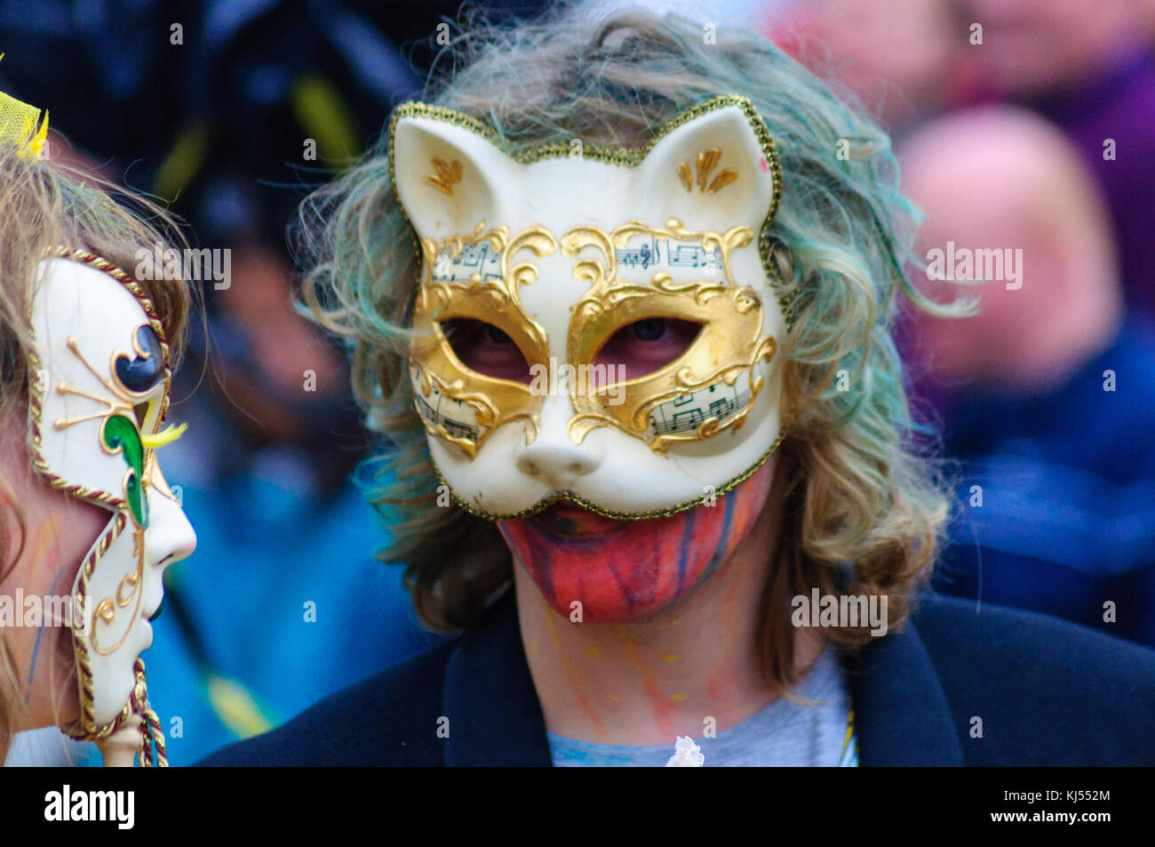 Male performer wearing a porcelain cat mask in the Carnival of The ...