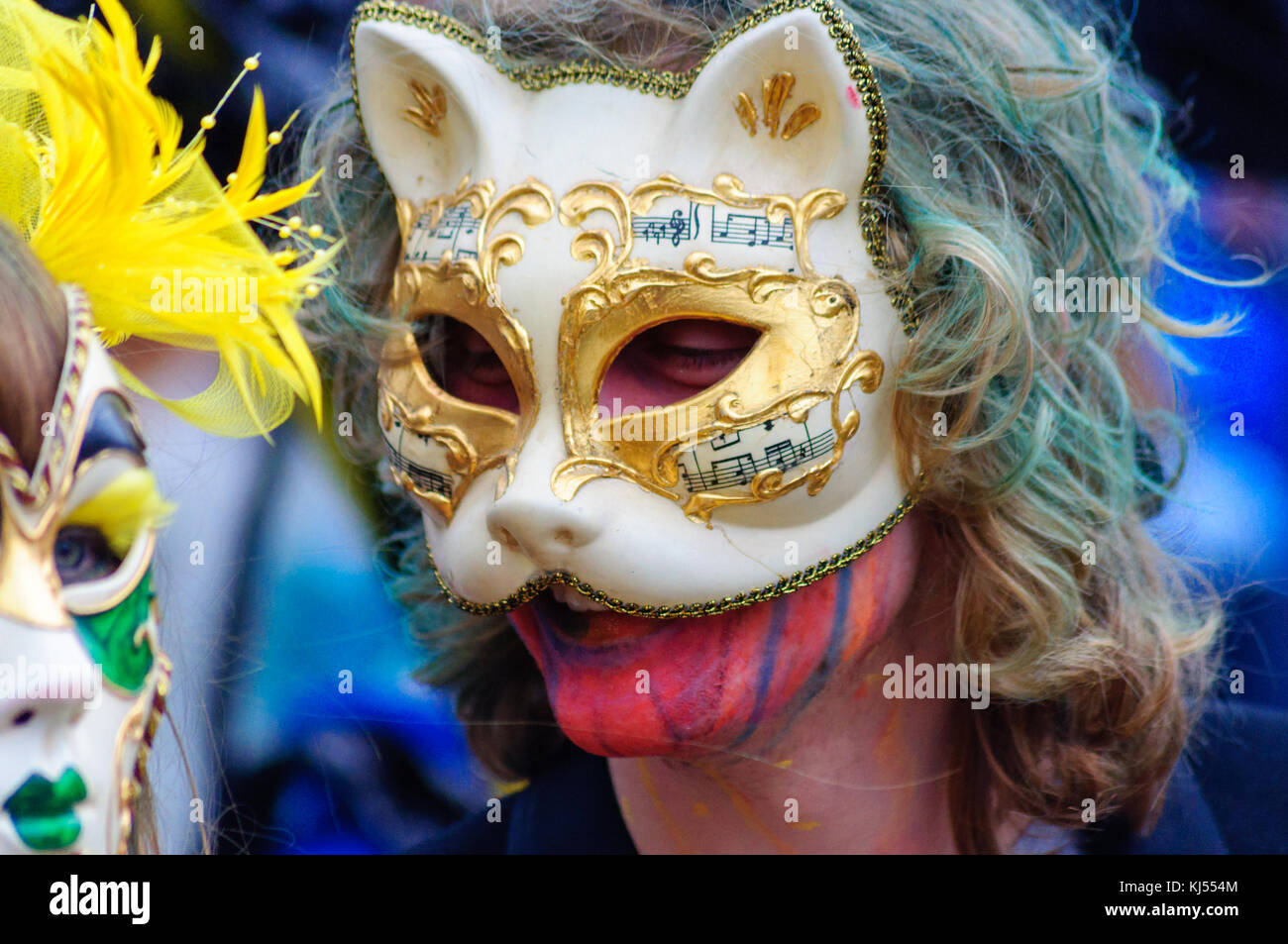 Male performer wearing a porcelain cat mask in the Carnival of The ...
