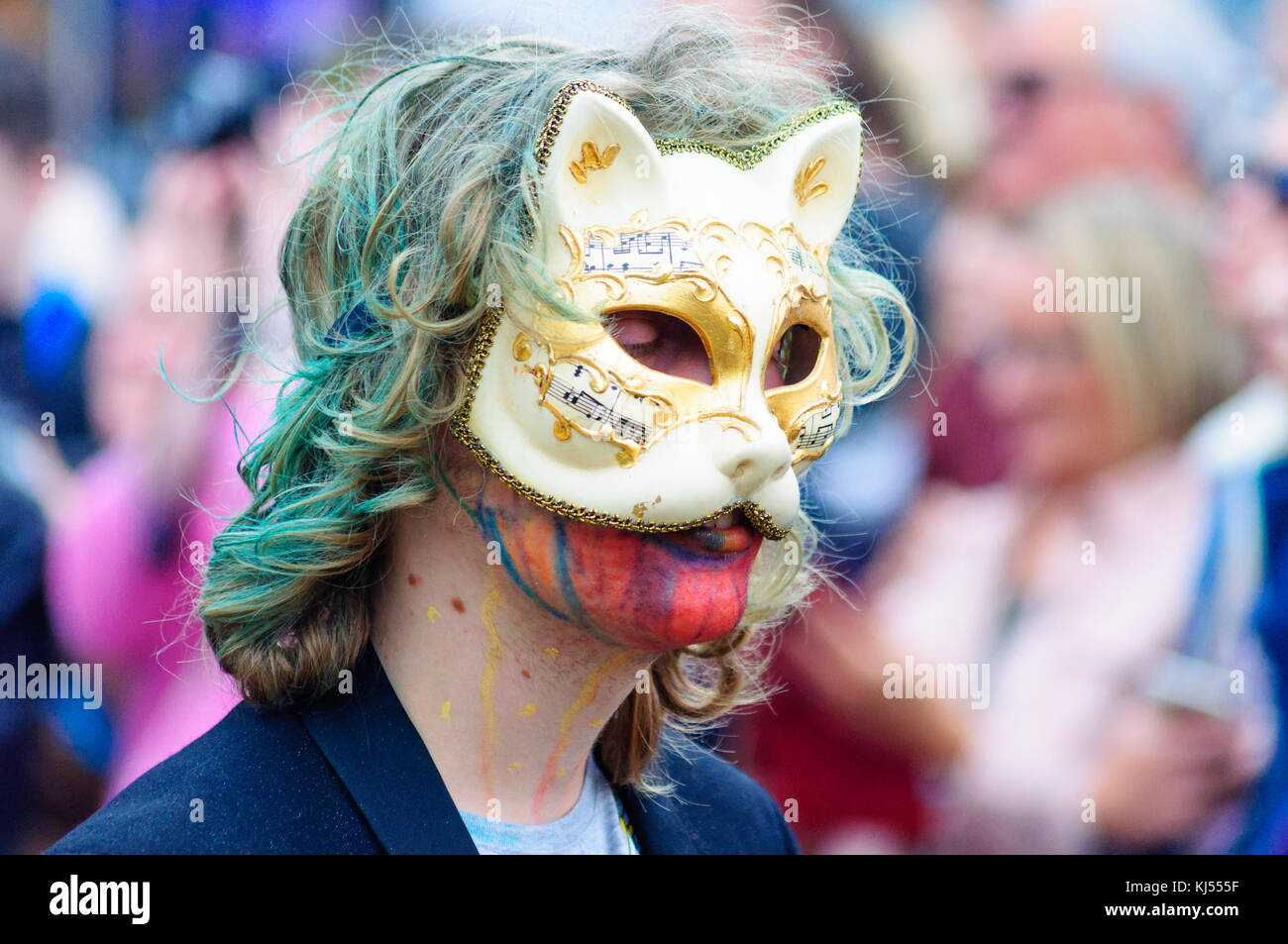 Male performer wearing a porcelain cat mask in the Carnival of The ...