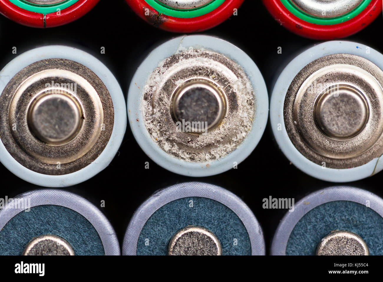 AA empty batteries group on black background Stock Photo - Alamy
