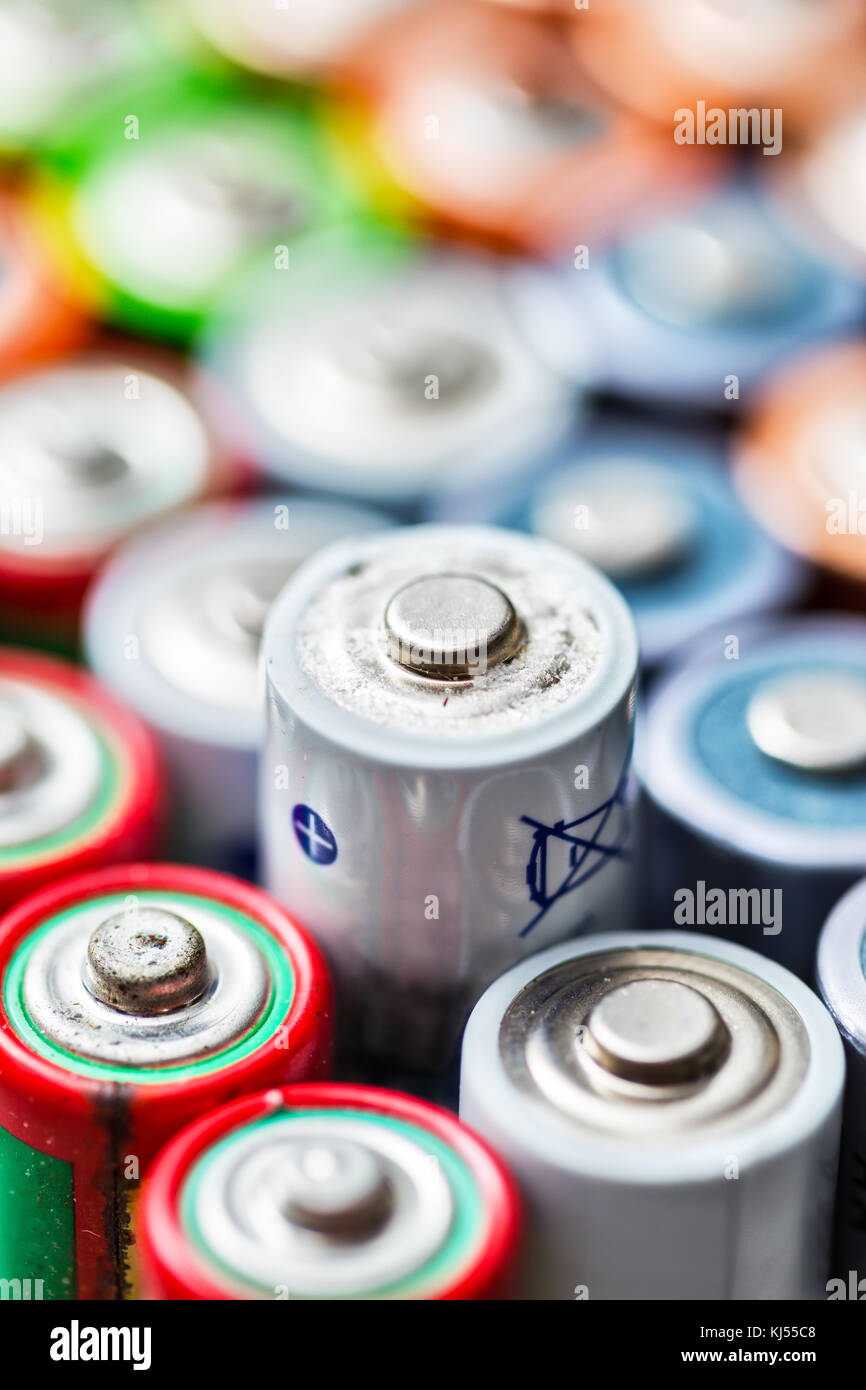 AA empty batteries group on black background Stock Photo - Alamy