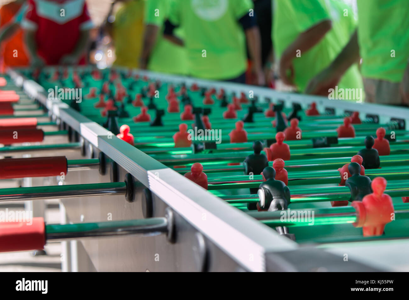 Very Long Table Football Game for Fifty Players Simultaneously Stock ...