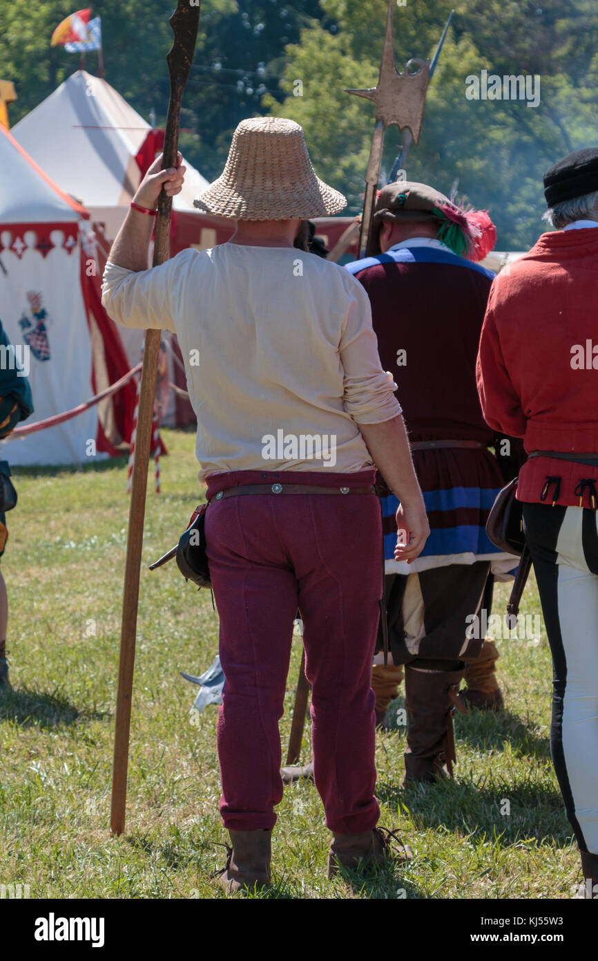 Guard with Pole Weapon and Straw Hat during Medieval Event Fair Stock ...