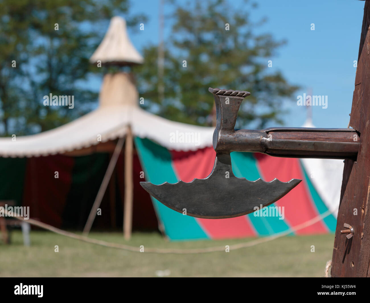 Closeup of Halberd, Medieval Pole Weapon and Tent in background Stock ...